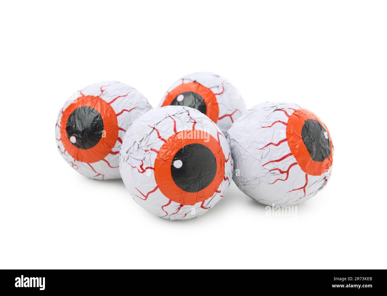 Delicious colorful candies in shape of eyes on white background ...