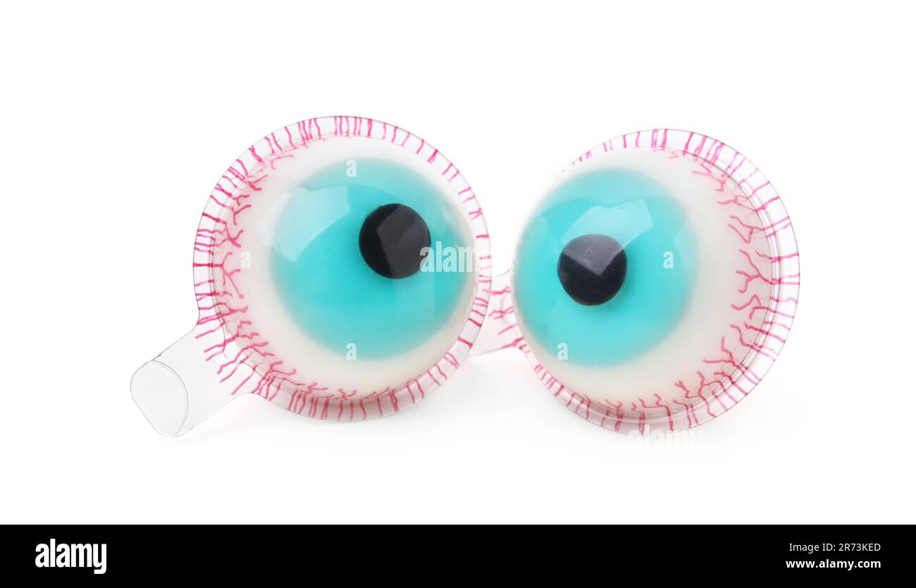 Delicious colorful candies in shape of eyes on white background ...