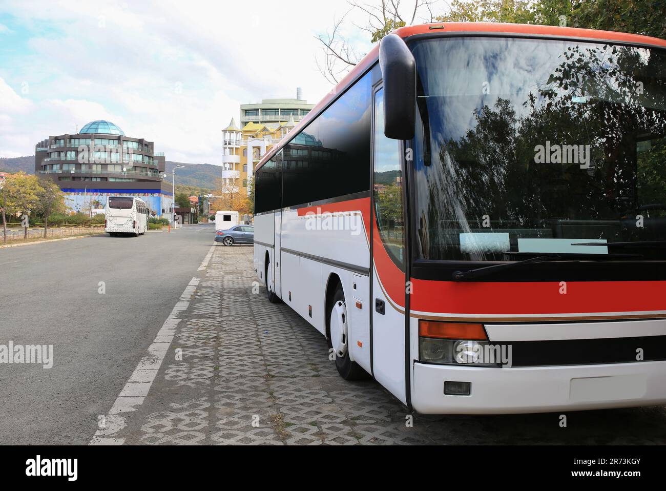 Modern bus on city street, space for text. Public transport Stock Photo ...