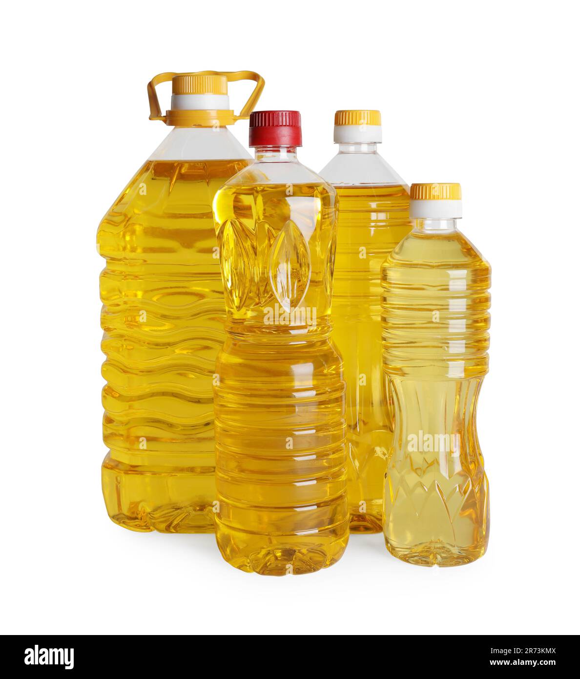 Bottles of cooking oil on white background Stock Photo - Alamy