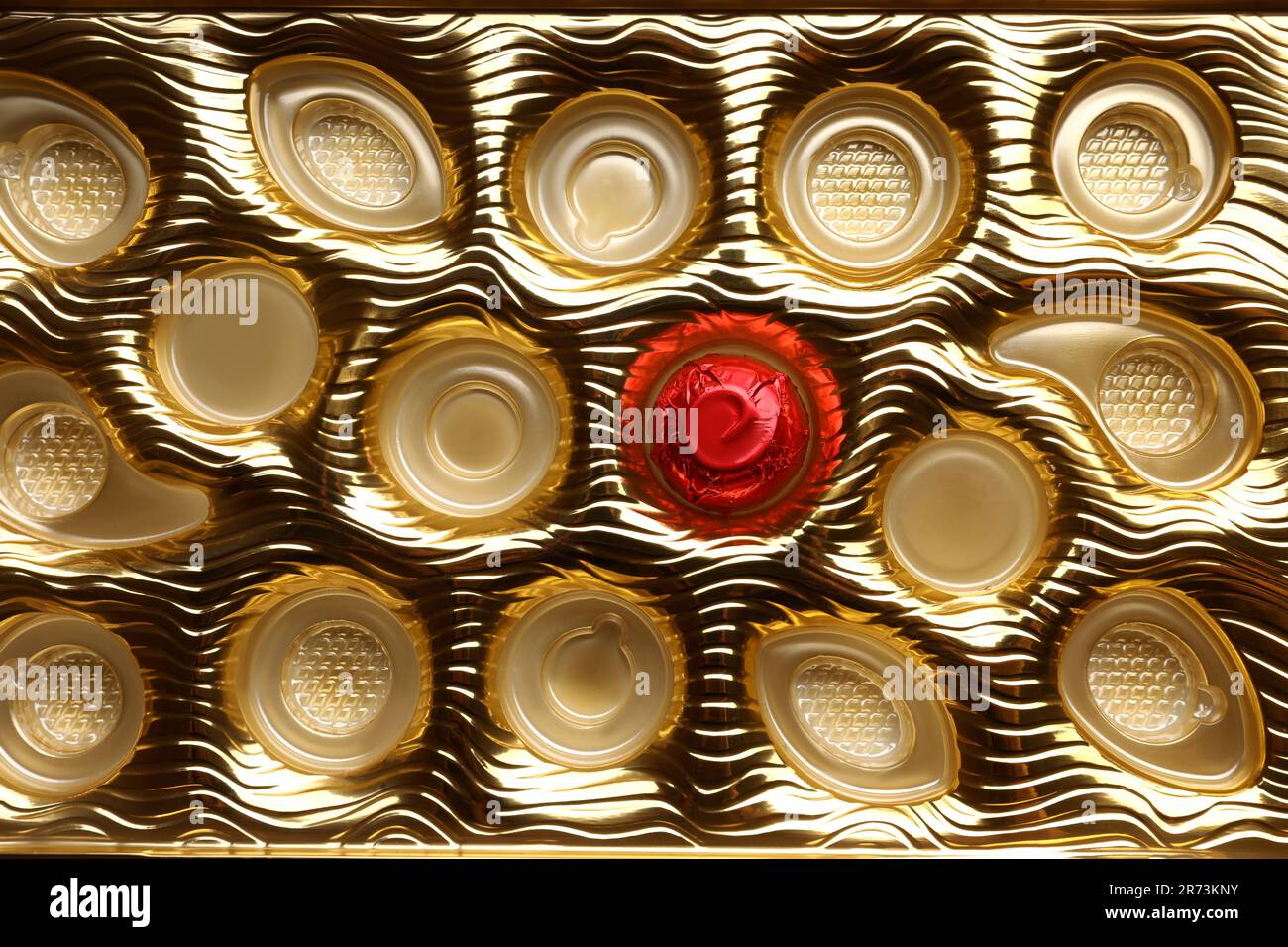 Partially empty box of chocolate candies as background, top view Stock ...