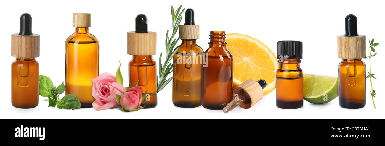 Many different essential oils and ingredients on white background ...