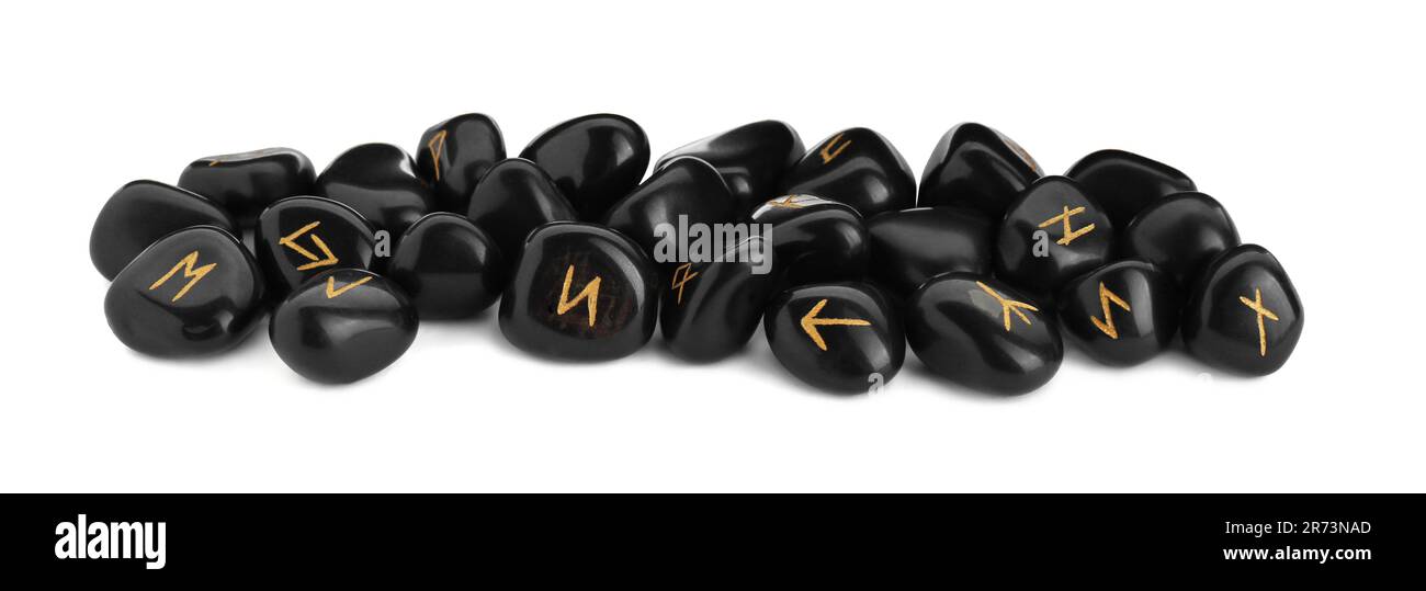 Pile of black rune stones isolated on white Stock Photo - Alamy