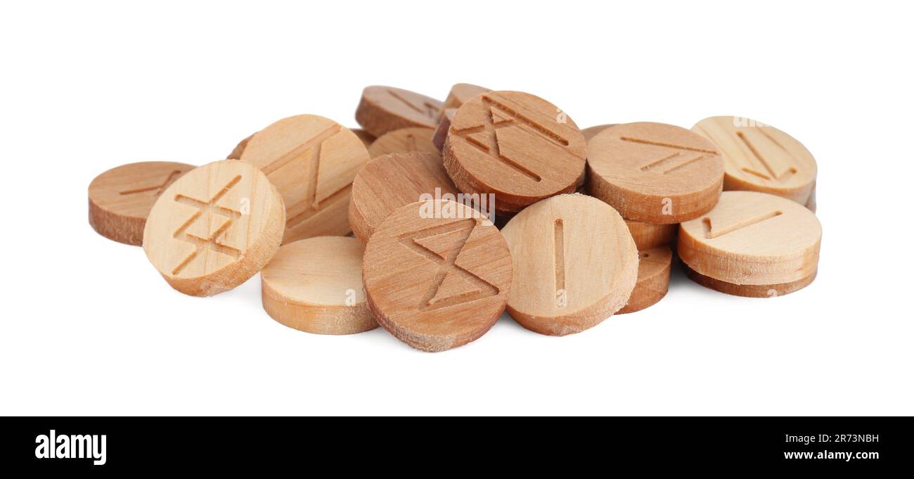 Pile of wooden runes isolated on white Stock Photo - Alamy