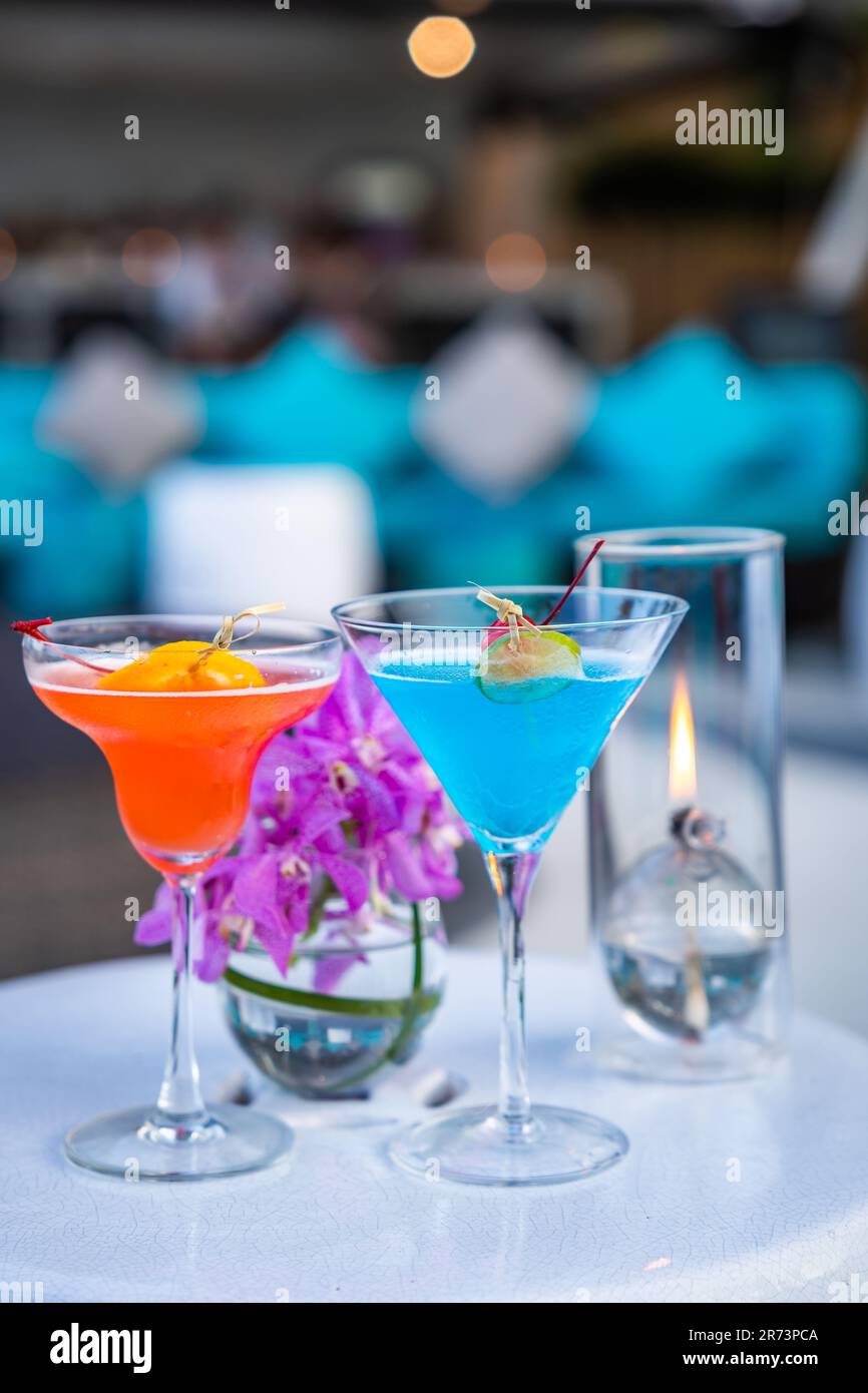Two cocktails blue and orange at a beach bar in Hua Hin, Thailand Stock ...