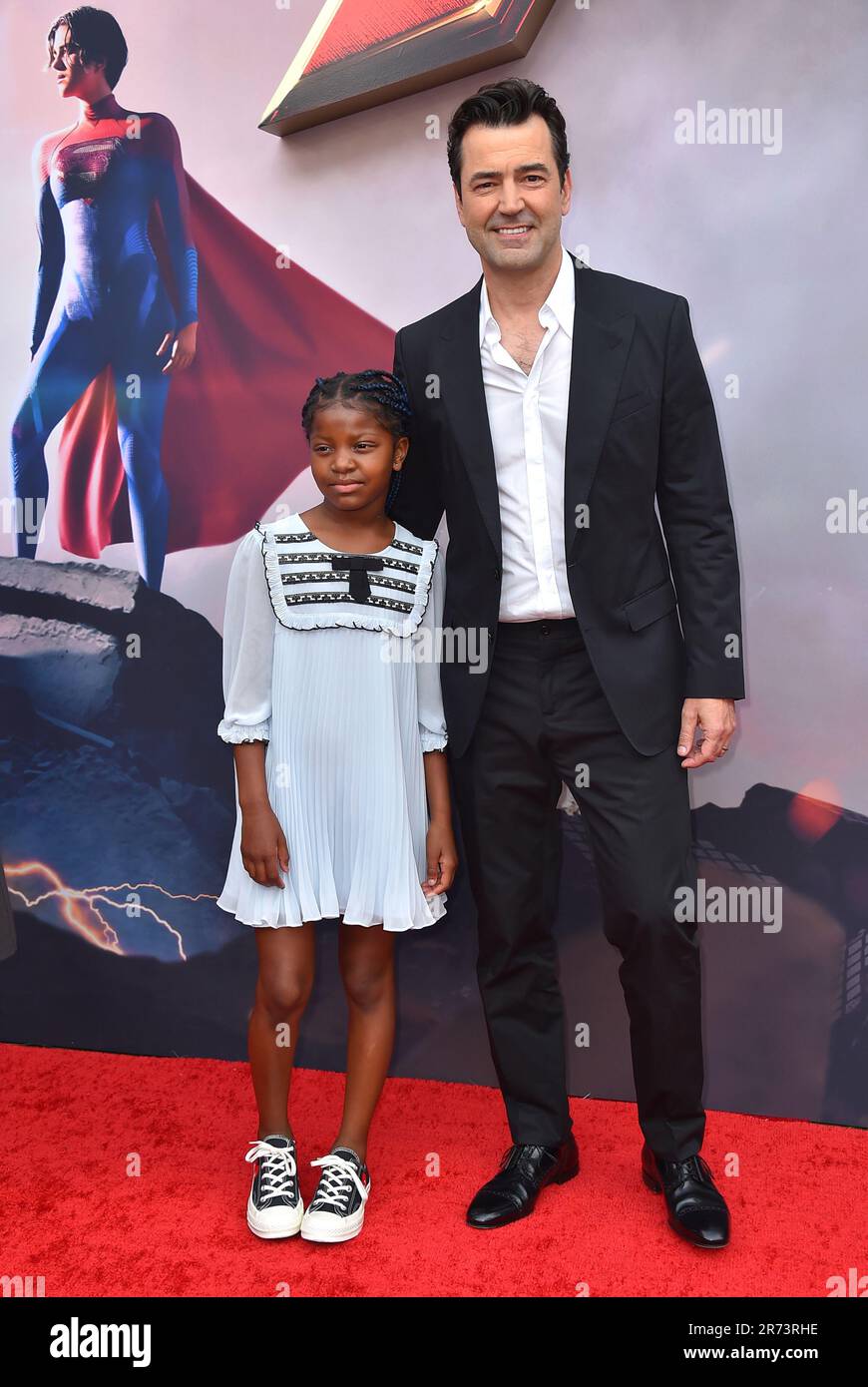 Ron Livingston, right, and daughter Gracie Livingston arrive at the ...