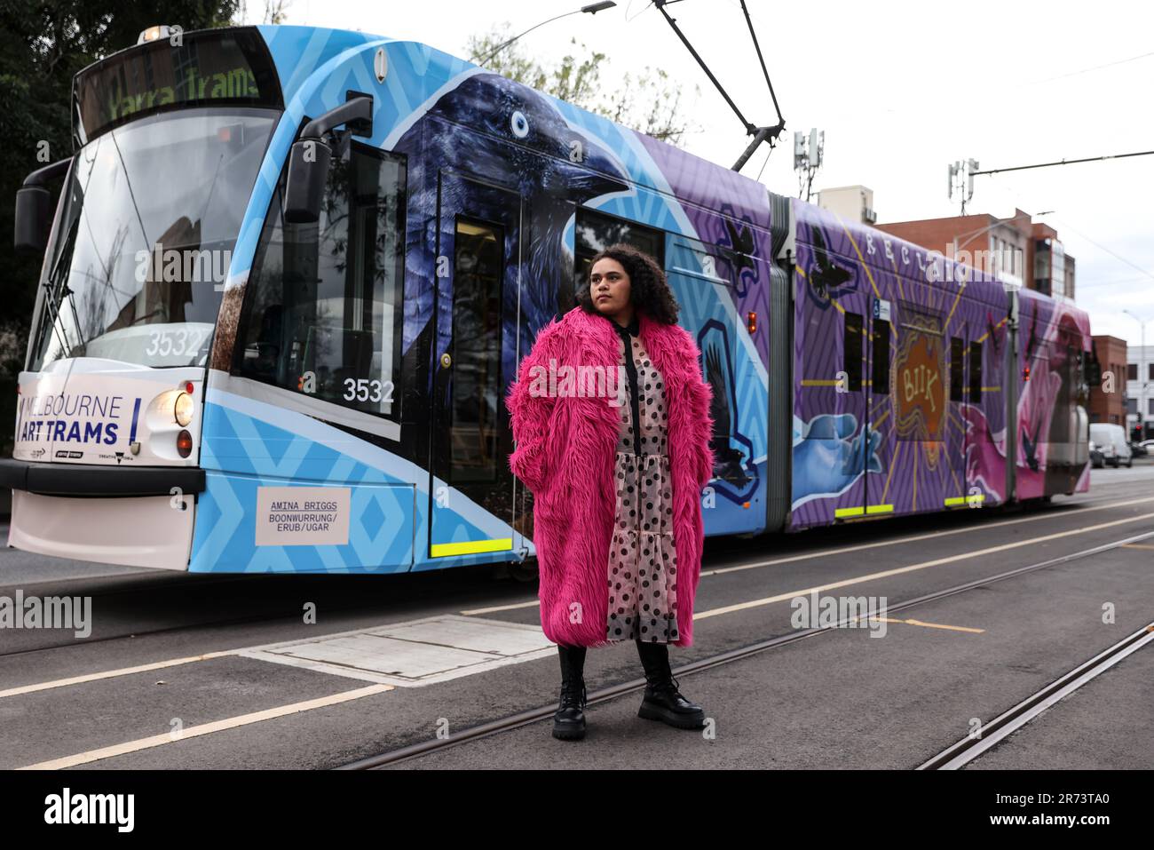 Artist Amina Briggs poses for a photograph during the unveiling of a specially designed tram as ...
