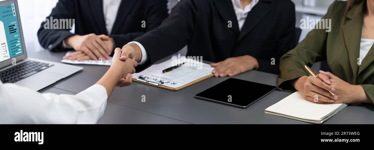 Interviewer handshaking the applicant hi-res stock photography and ...
