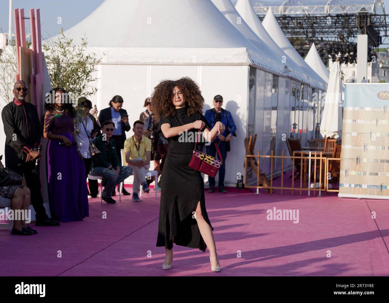 A model Becker Ambesi Orlane parades with designer Christelle Traore's ...