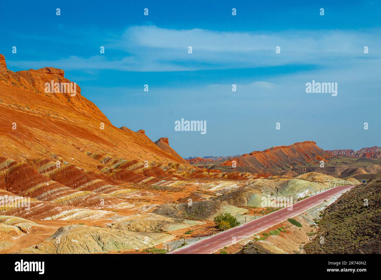 The way through the rainbow Colorful rock formations in the Zhangye ...