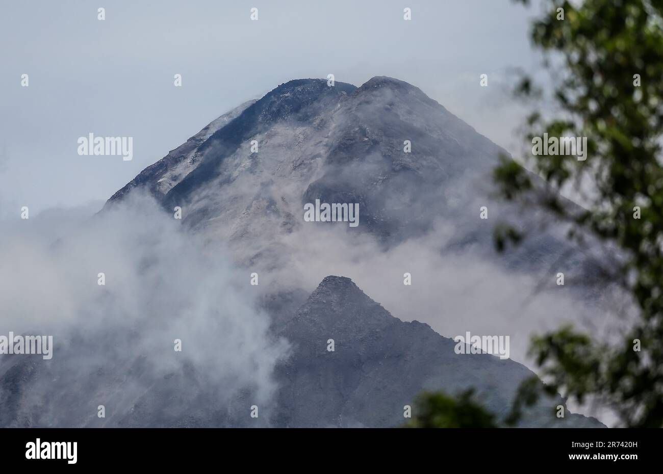 Manila, Philippines. 12th June, 2023. The Mayon volcano is seen in ...