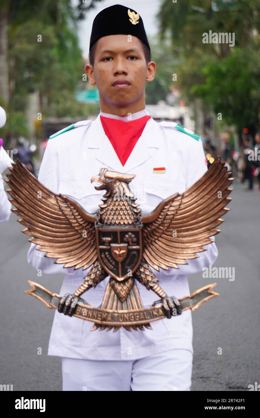Indonesian holding Garuda Pancasila (Indonesia five principles Stock ...