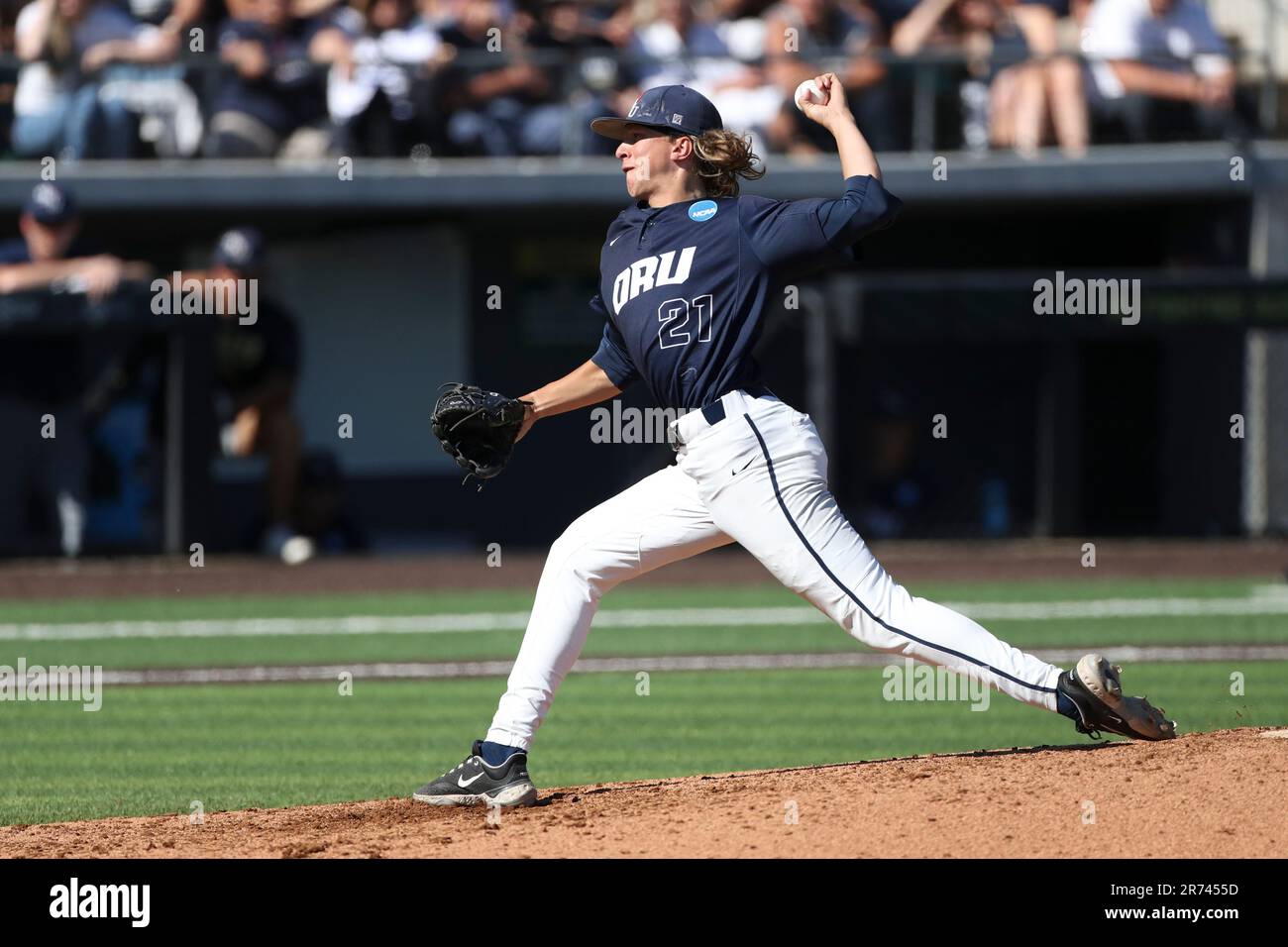 Oral Roberts pitcher Caleb Isaacs throws against Oregon during an NCAA ...
