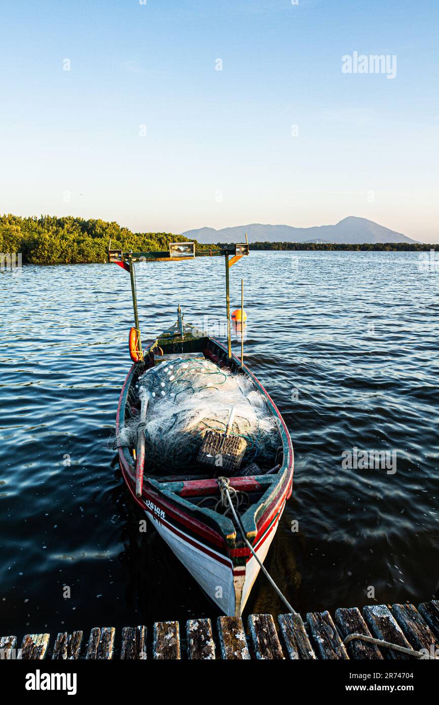A fishing boat seen at Pirajubae Marine Extractive Reserve Stock Photo ...