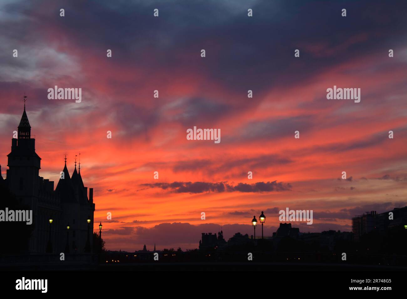 Scarlet Sunset by the Conciergerie, Paris Stock Photo - Alamy