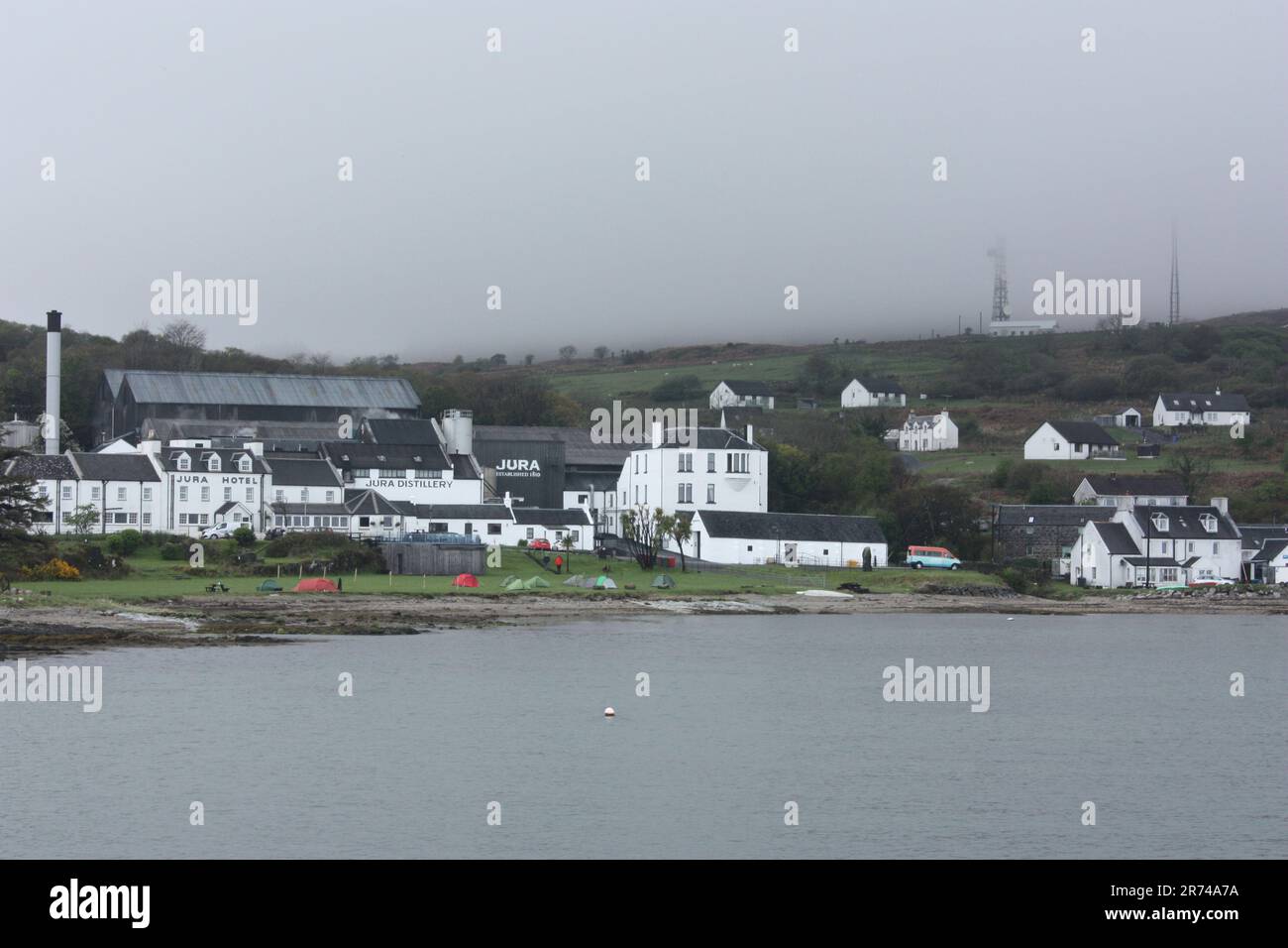 The town of Craighouse seen across Small Isles Bay, Isle of Jura ...