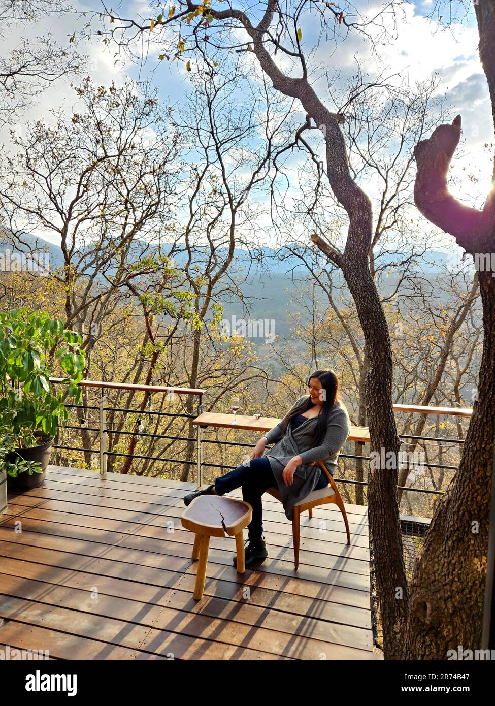 40-year-old divorced single Latino adult woman is sitting on the ...