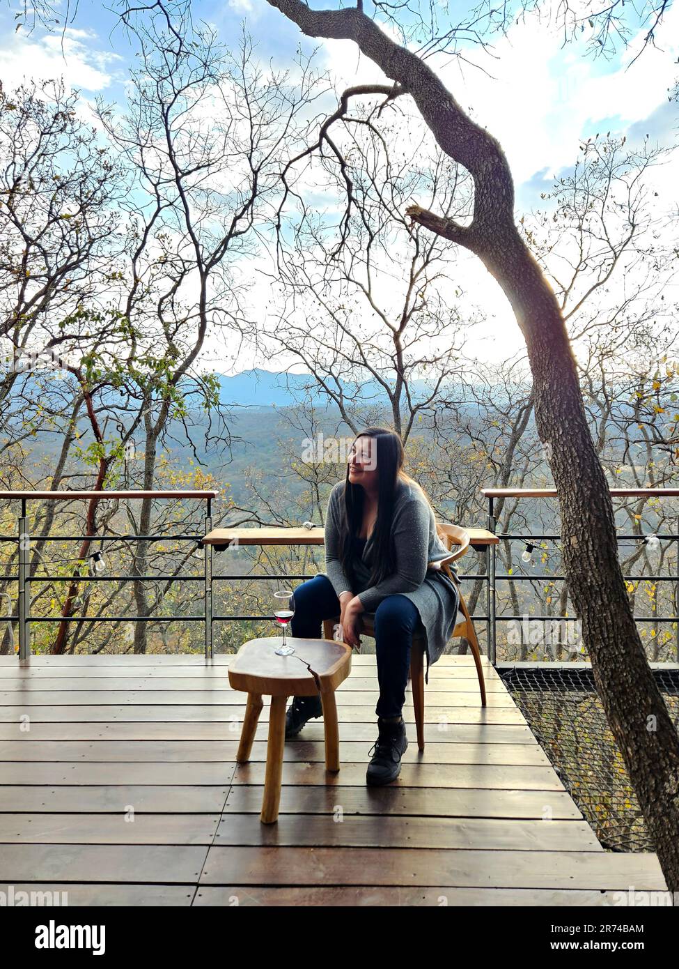 40-year-old divorced single Latino adult woman is sitting on the ...