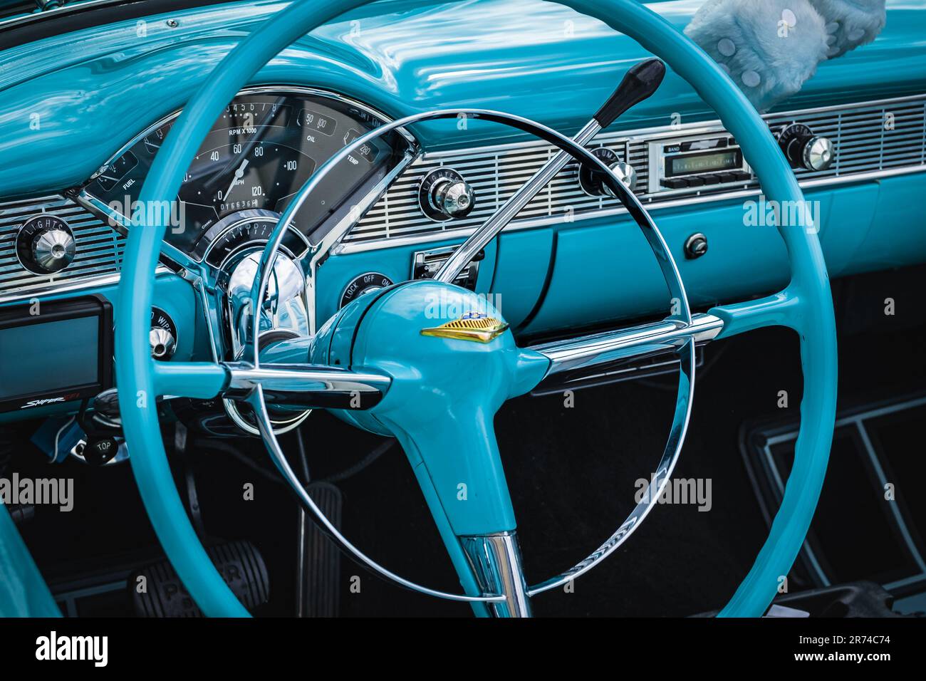 Close up on old vintage car steering wheel and cockpit. Retro styled ...