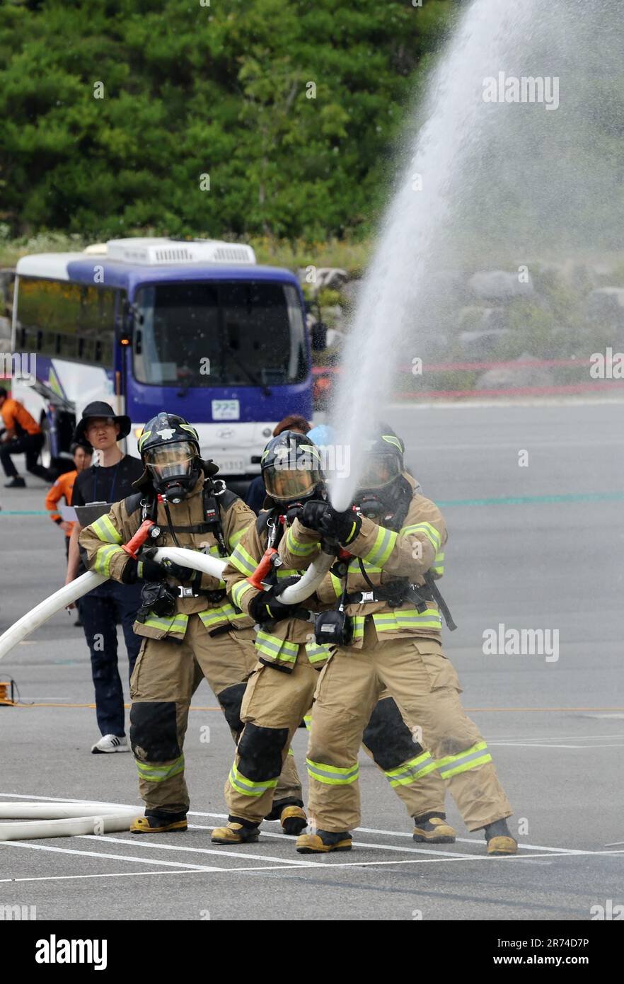 13th June, 2023. Firefighters' contest Firefighters douse an imaginary ...