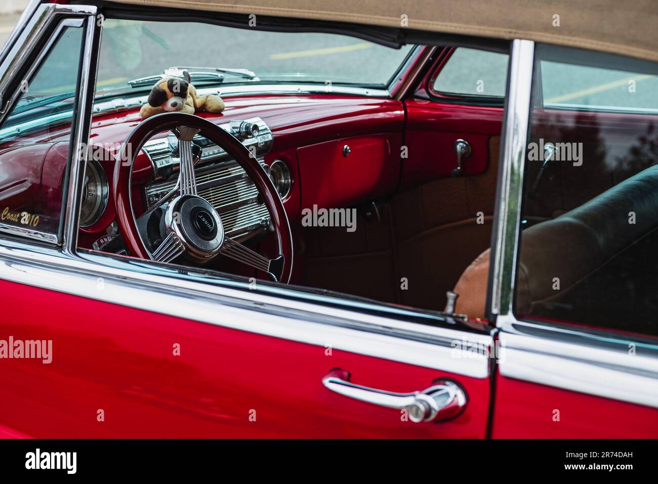 Old vintage Red car with steering wheel and cockpit. Retro styled image ...