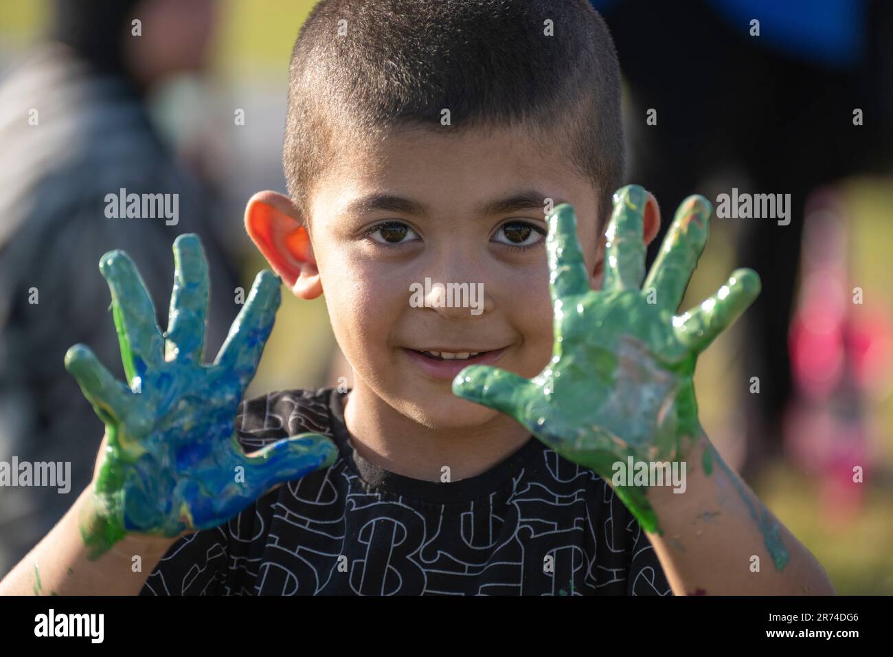 Young Arab boy enjoys finger painting Israeli Arabs and Jews enjoy ...