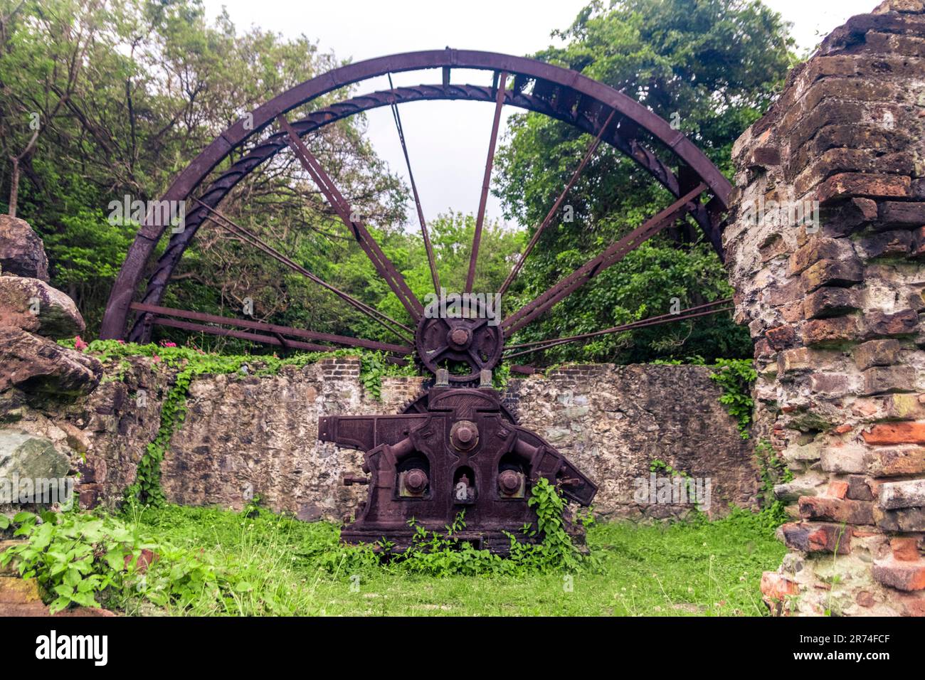 A scenic shot of a traditional water wheel in Speyside, Trinidad and ...