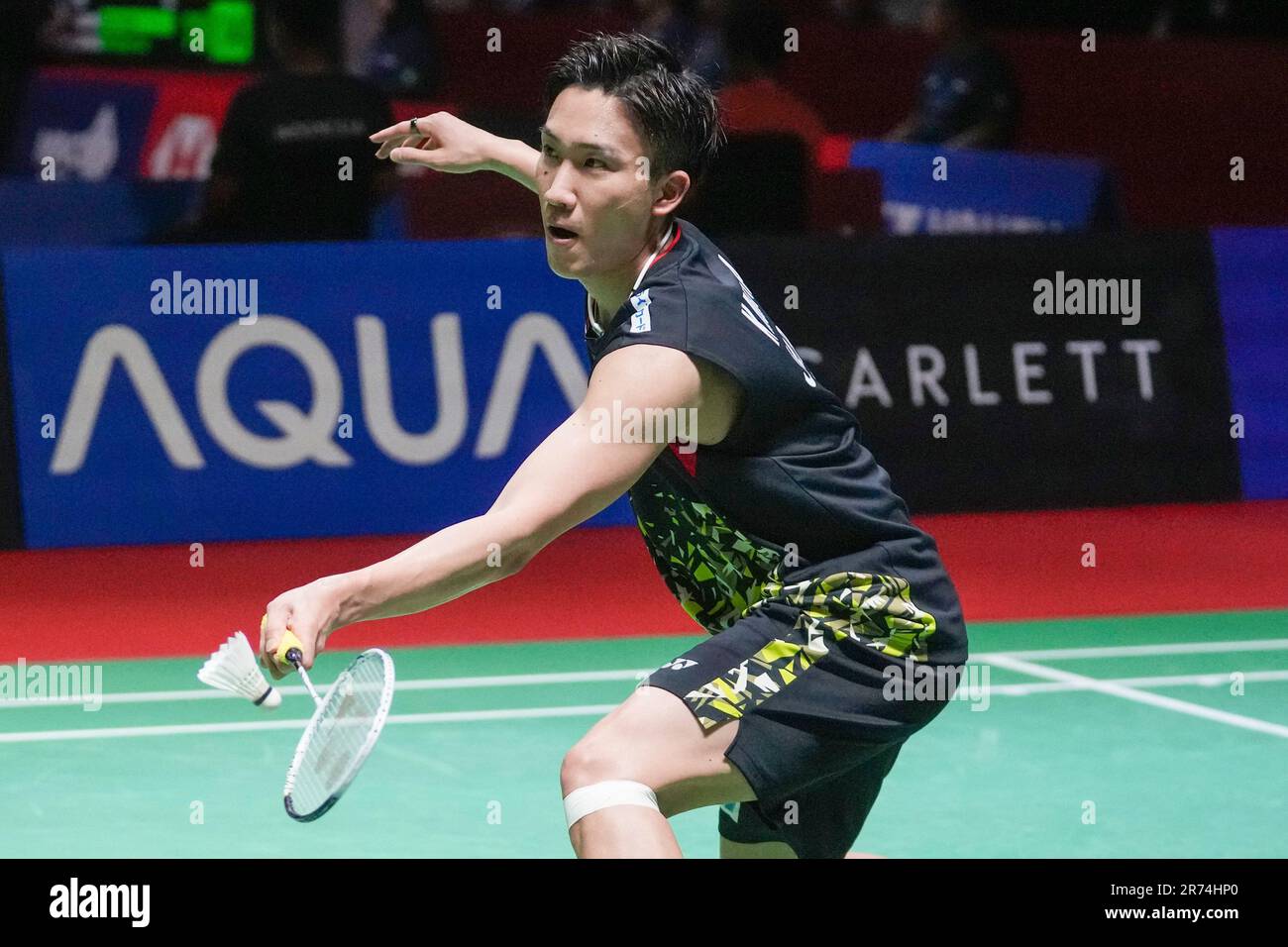 Kento Momota of Japan competes against Ng Ka Long Angus of Hong Kong ...