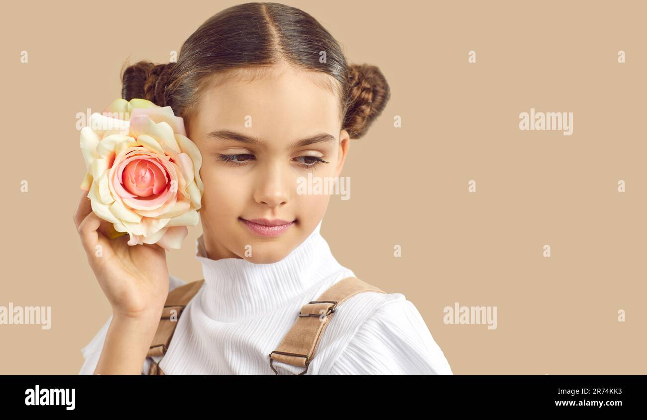 Beautiful cute teen girl holding bud of blooming peony, isolated on ...