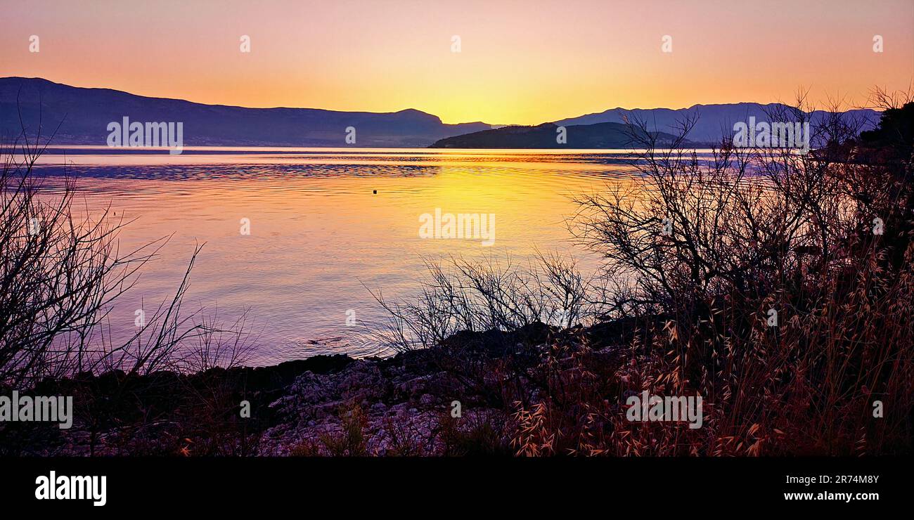 A stunning landscape featuring an expansive beach with majestic ...