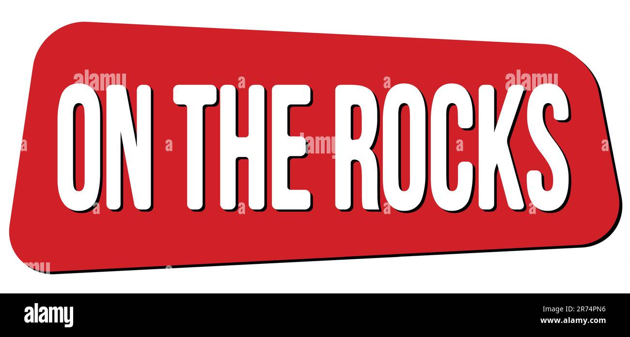 ON THE ROCKS text written on red trapeze stamp sign Stock Photo - Alamy