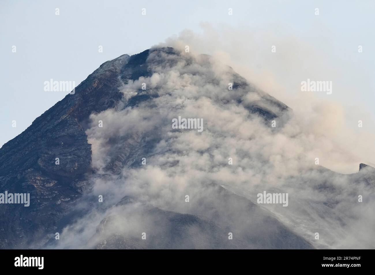 Steam from Mayon volcano is seen from Daraga town, Albay province ...