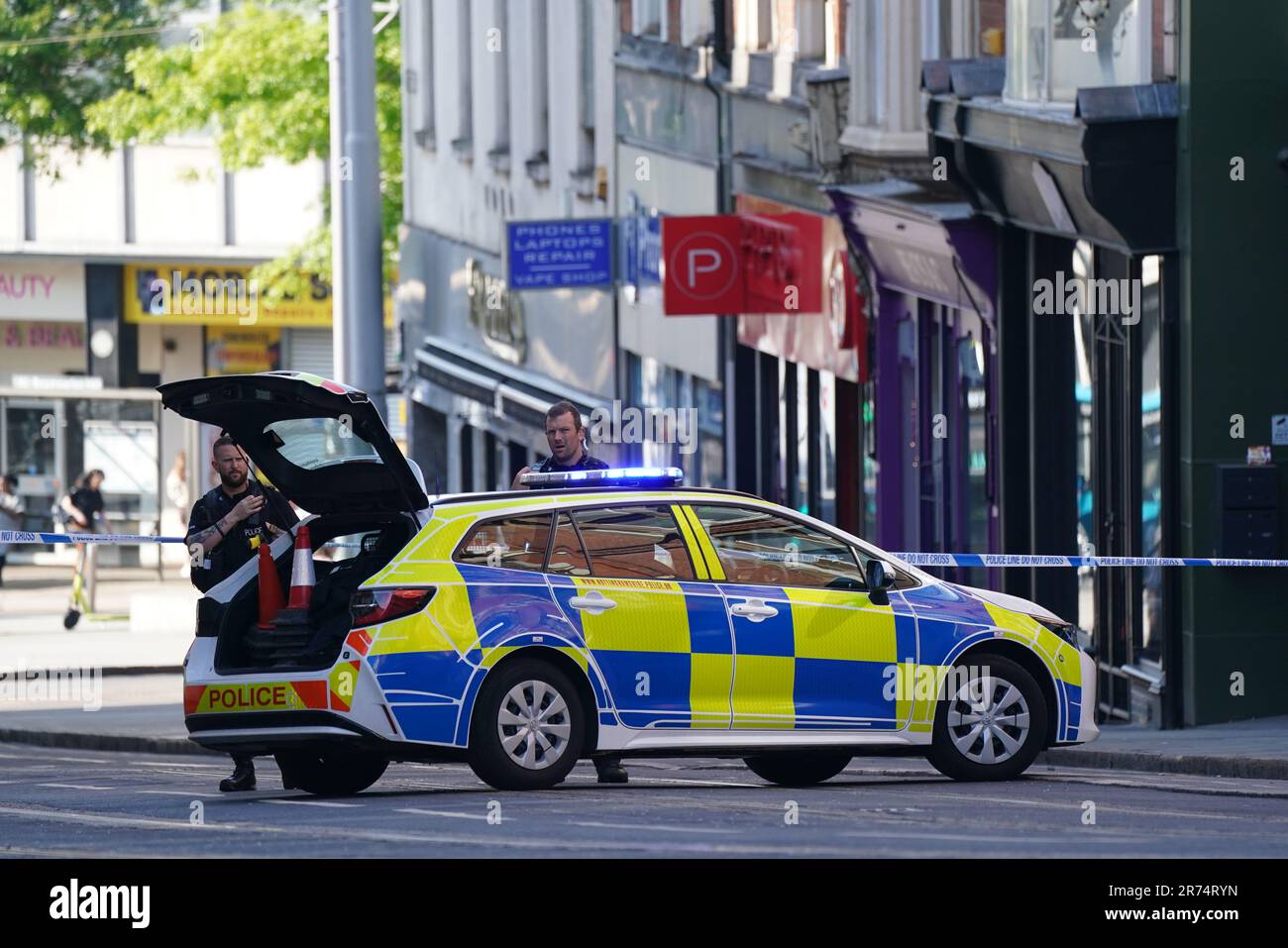 Police officers in Nottingham city centre, as police have put in place ...