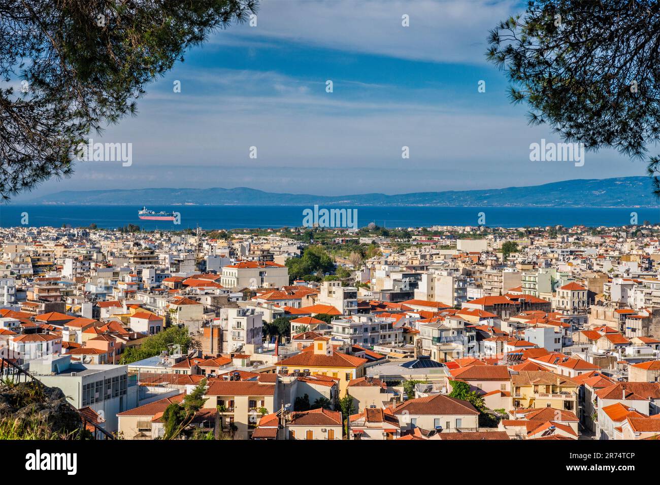 Old Town section of Kalamata, cargo ship at Gulf of Messinia, view from ...