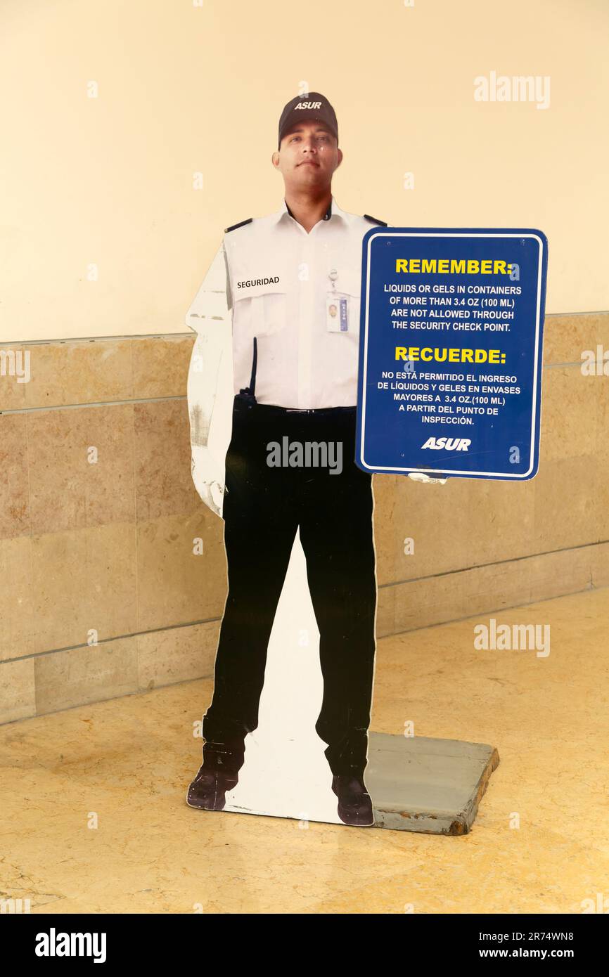 Cardboard security guard reminder about liguid gels at security check ...