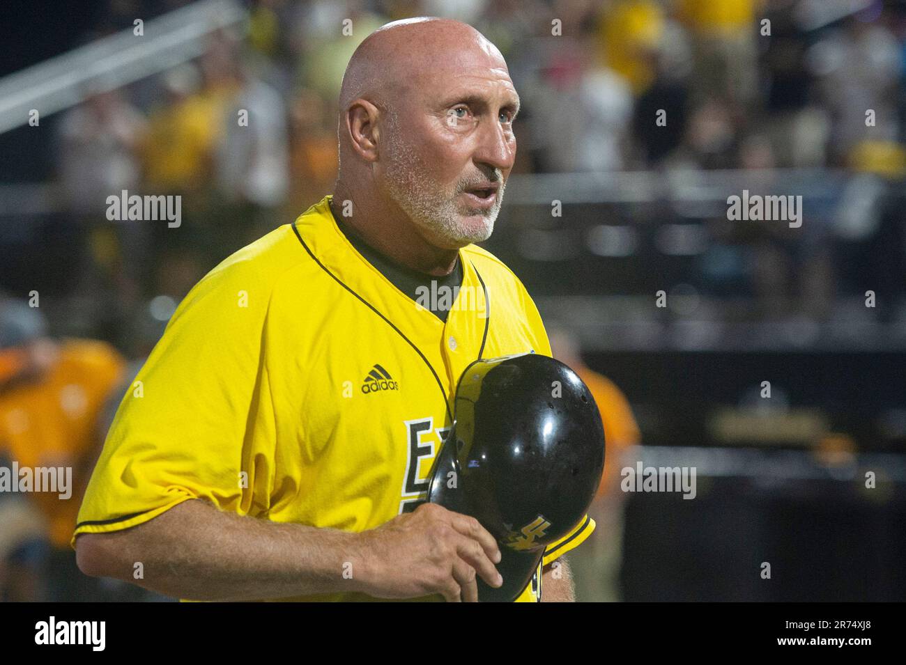 Southern Mississippi baseball coach Scott Berry tips his hat to the ...