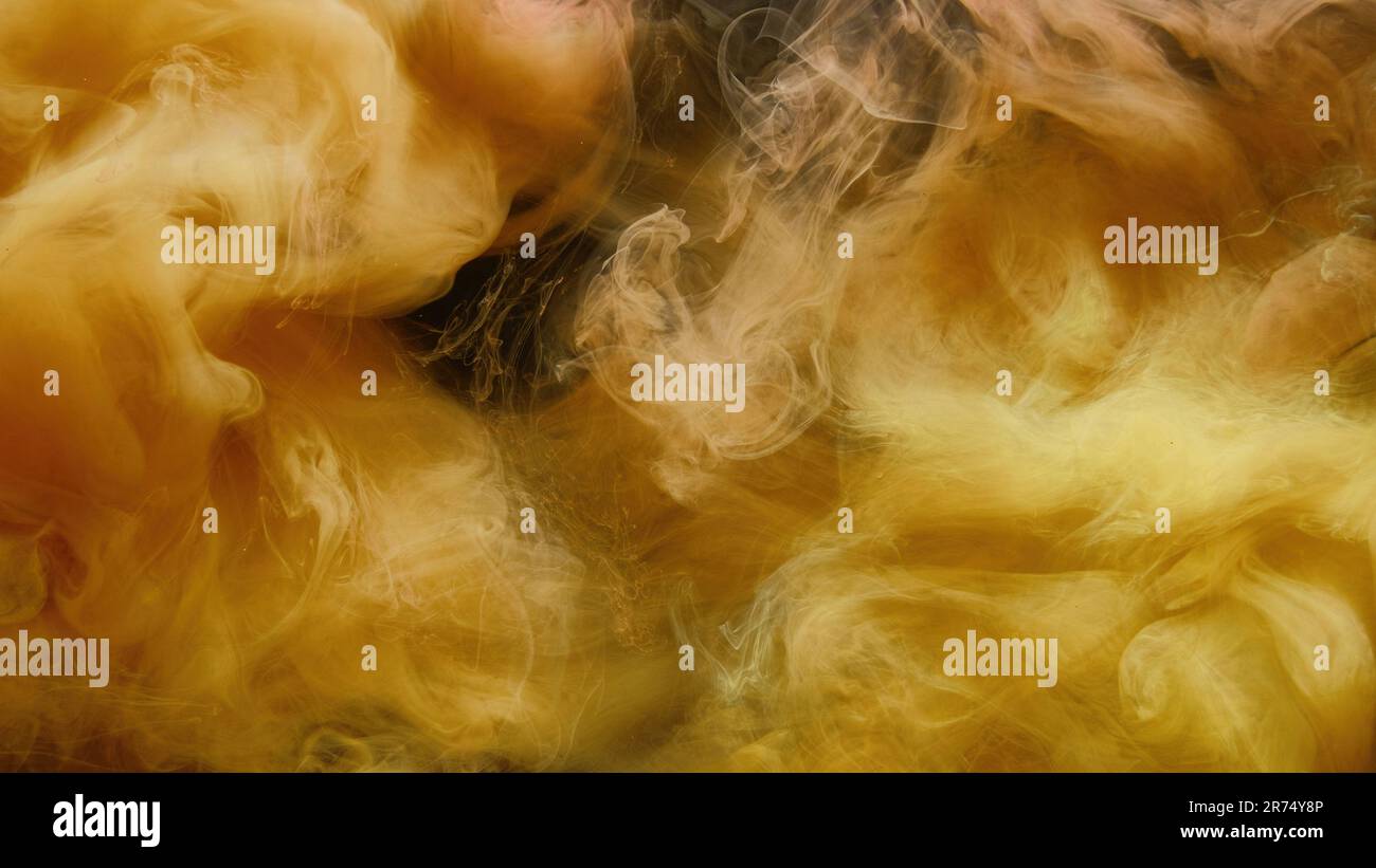 Ink water color vapor cloud yellow smoke texture Stock Photo - Alamy
