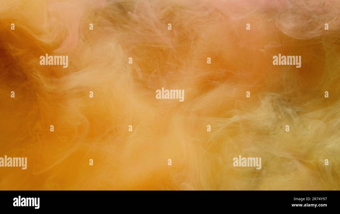 Color steam cloud abstract background yellow smoke Stock Photo - Alamy