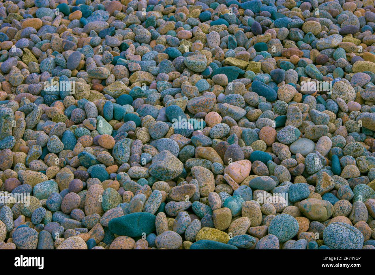 Natural stone background from colorful pebbles Stock Photo - Alamy