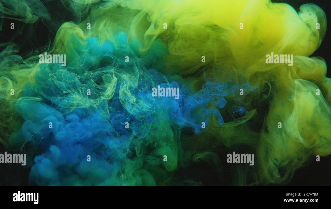 Color smoke paint water mix green blue mist cloud Stock Photo - Alamy