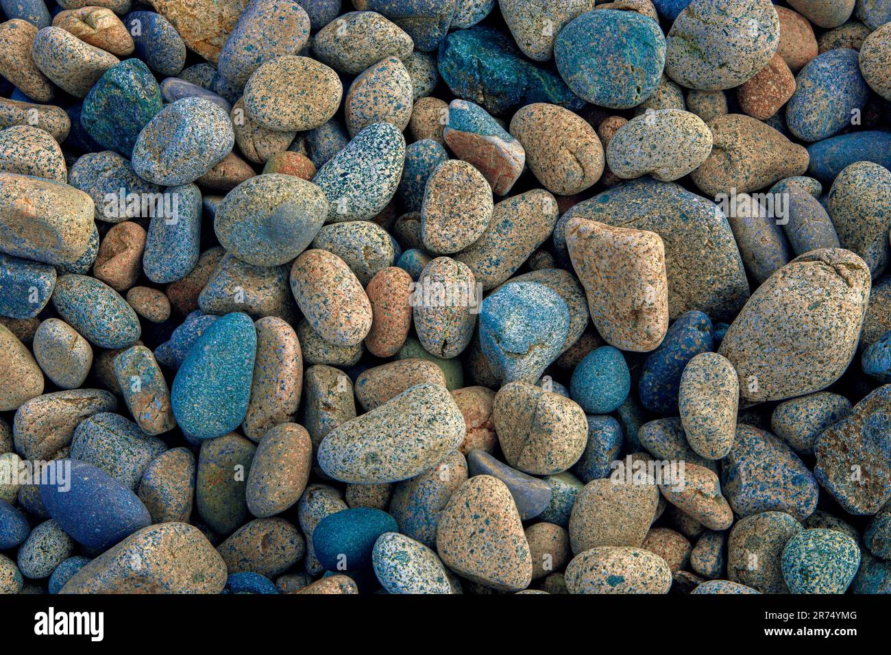 Natural stone background from colorful pebbles Stock Photo - Alamy