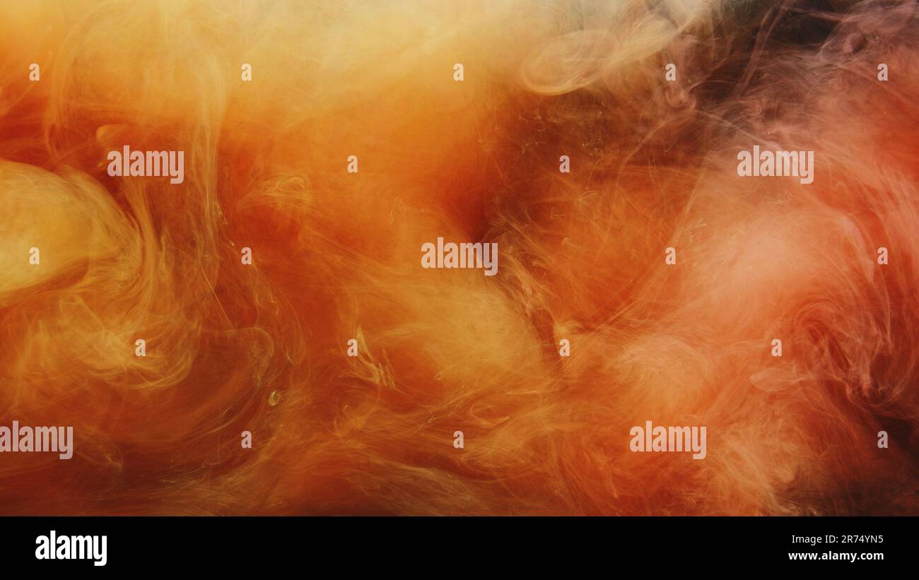 Color vapor splash ink water orange cloud texture Stock Photo - Alamy