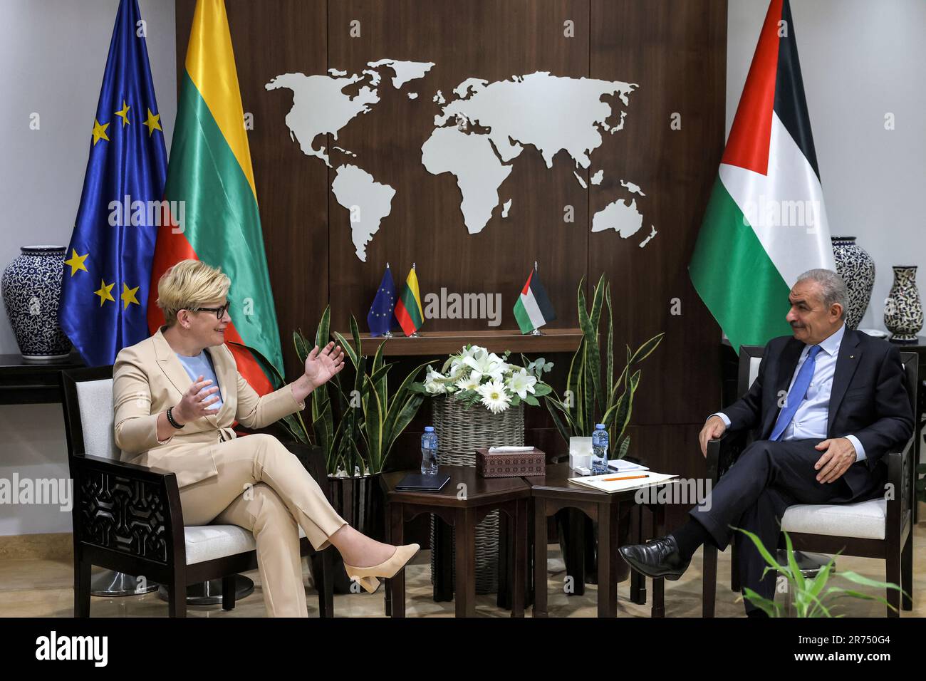 Palestinian Prime Minister Mohammad Shtayyeh, right, meets Lithuanian ...