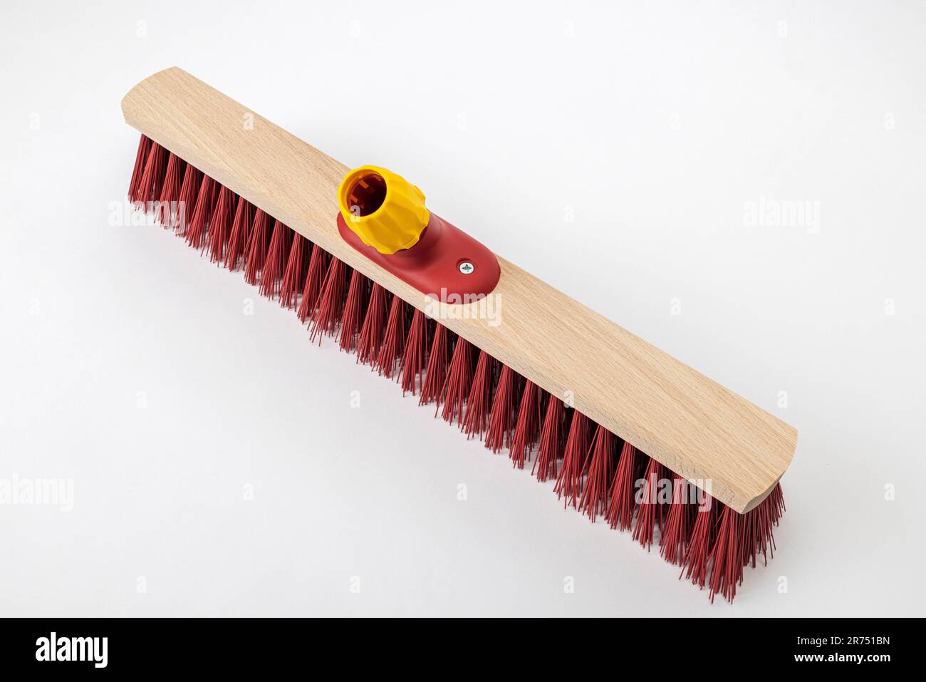 Street broom with red bristles, without wooden handle, detail, white ...