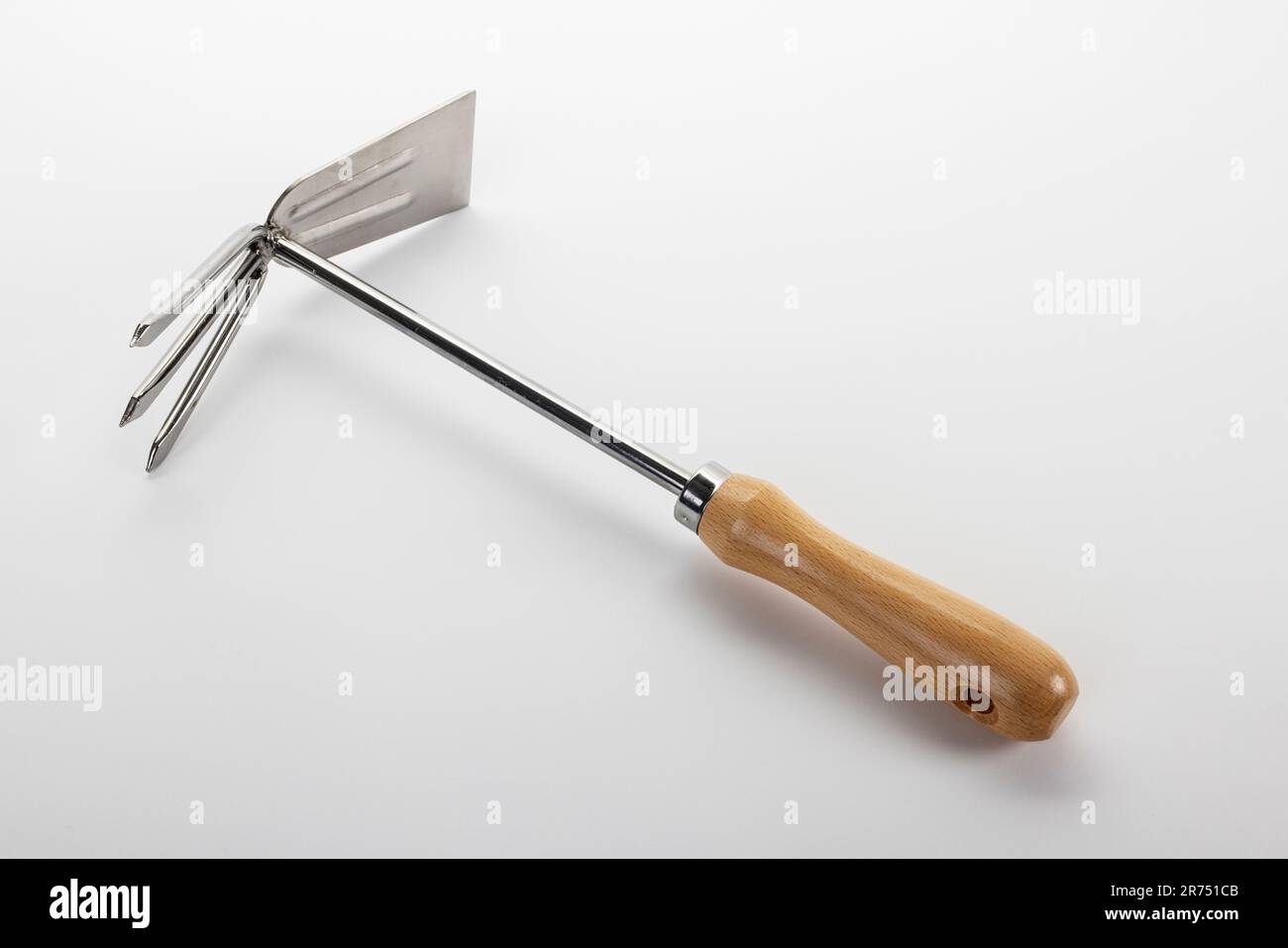 Double hoe with wooden handle, white background Stock Photo - Alamy