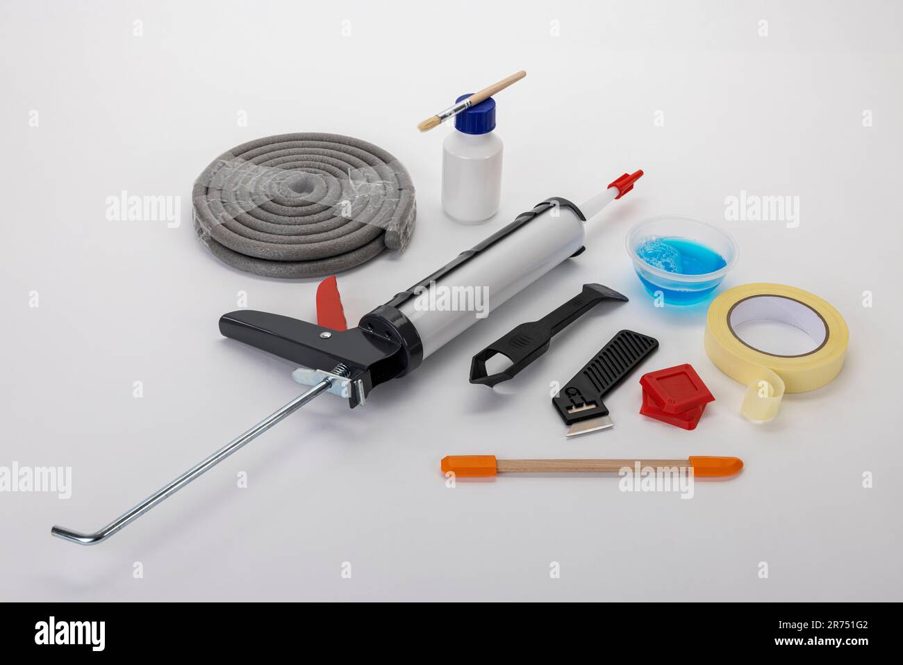 Half shell cartridge press with silicone cartridge lying without label ...