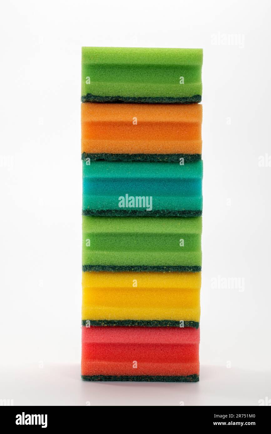 Stack of colorful cleaning sponges with handle, white background Stock ...