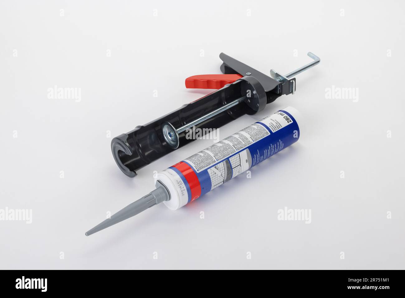 Half shell cartridge press in front of it silicone cartridge lying ...