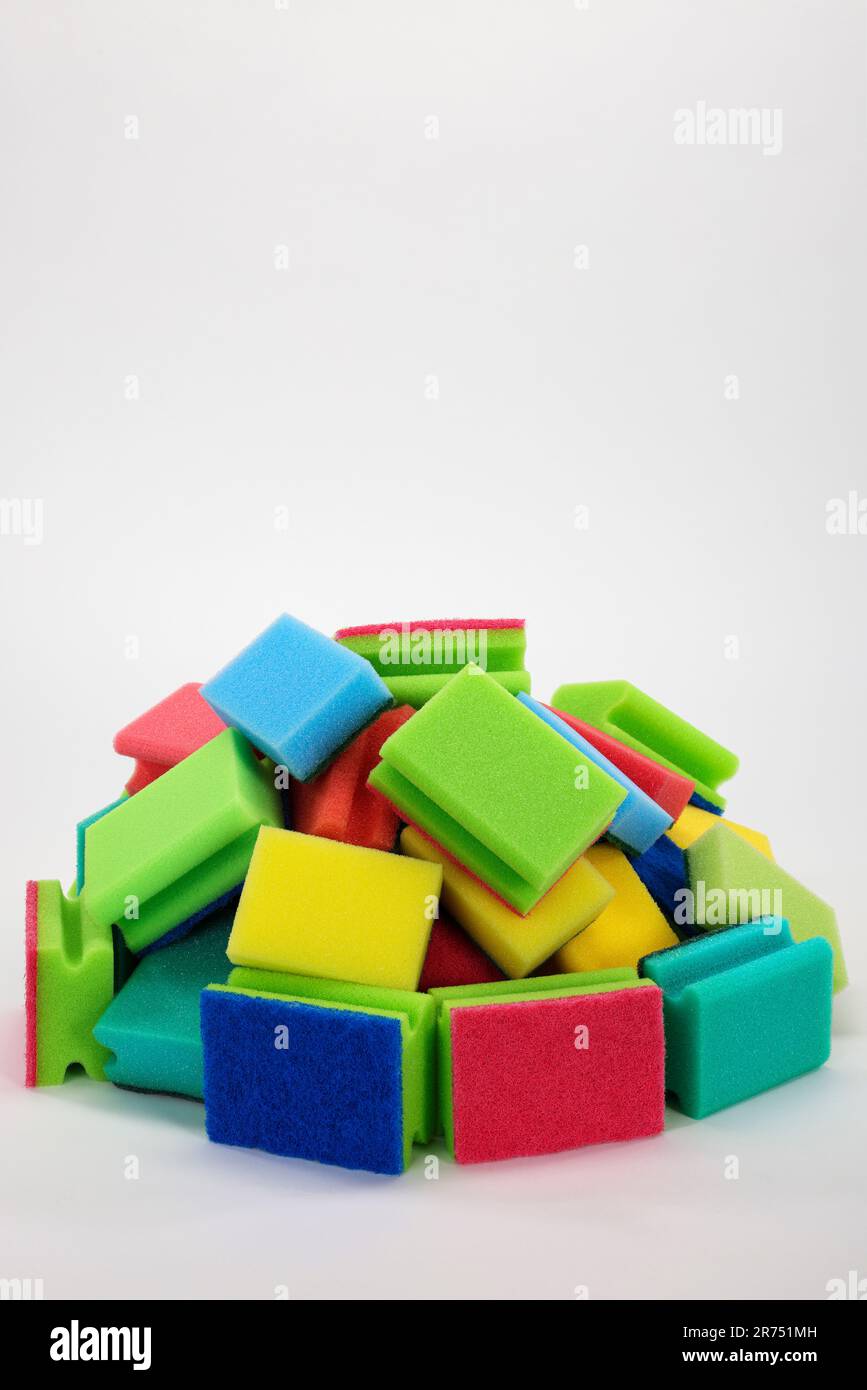 Many colorful cleaning sponges, white background Stock Photo - Alamy