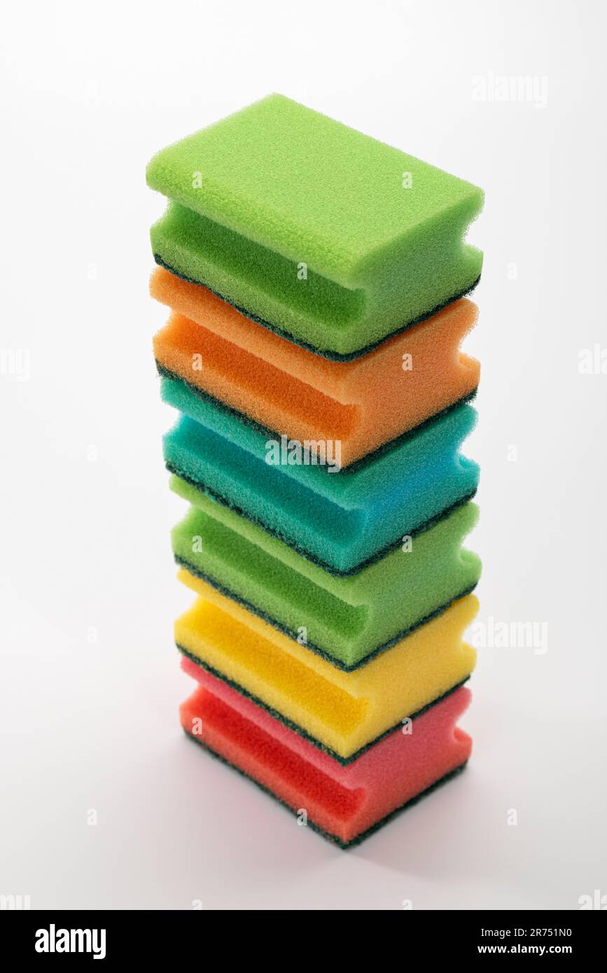Stack of colorful cleaning sponges with handle, white background Stock ...